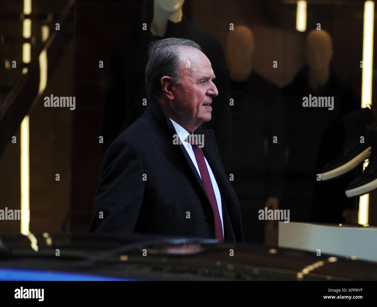 Milan, Ennio Doris shopping downtown with driver Ennio Doris, president ...