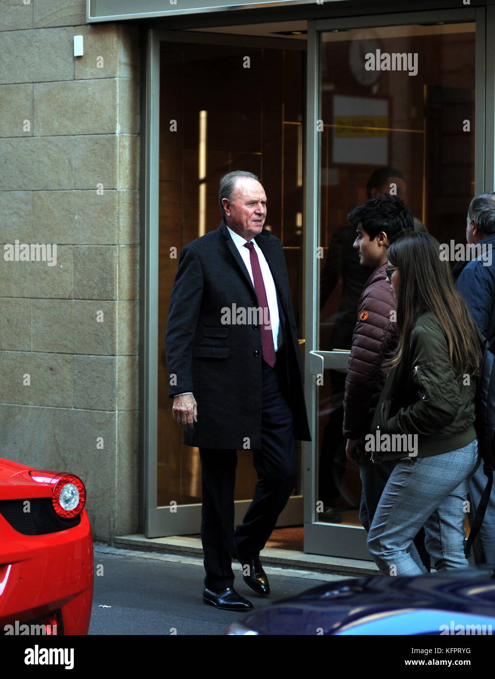 Milan, Ennio Doris shopping downtown with driver Ennio Doris, president ...