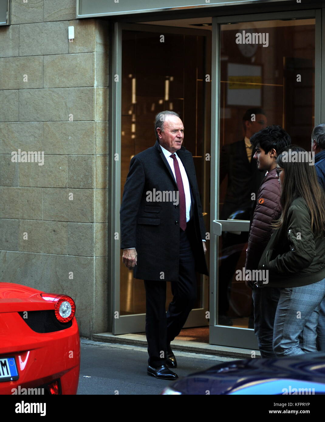 Milan, Ennio Doris shopping downtown with driver Ennio Doris, president ...