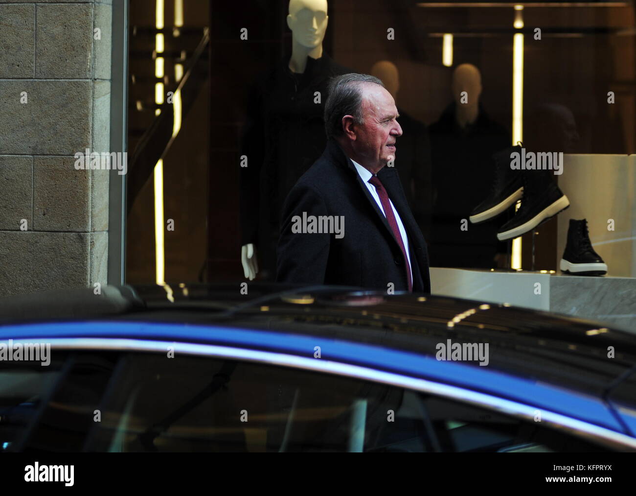 Milan, Ennio Doris shopping downtown with driver Ennio Doris, president ...