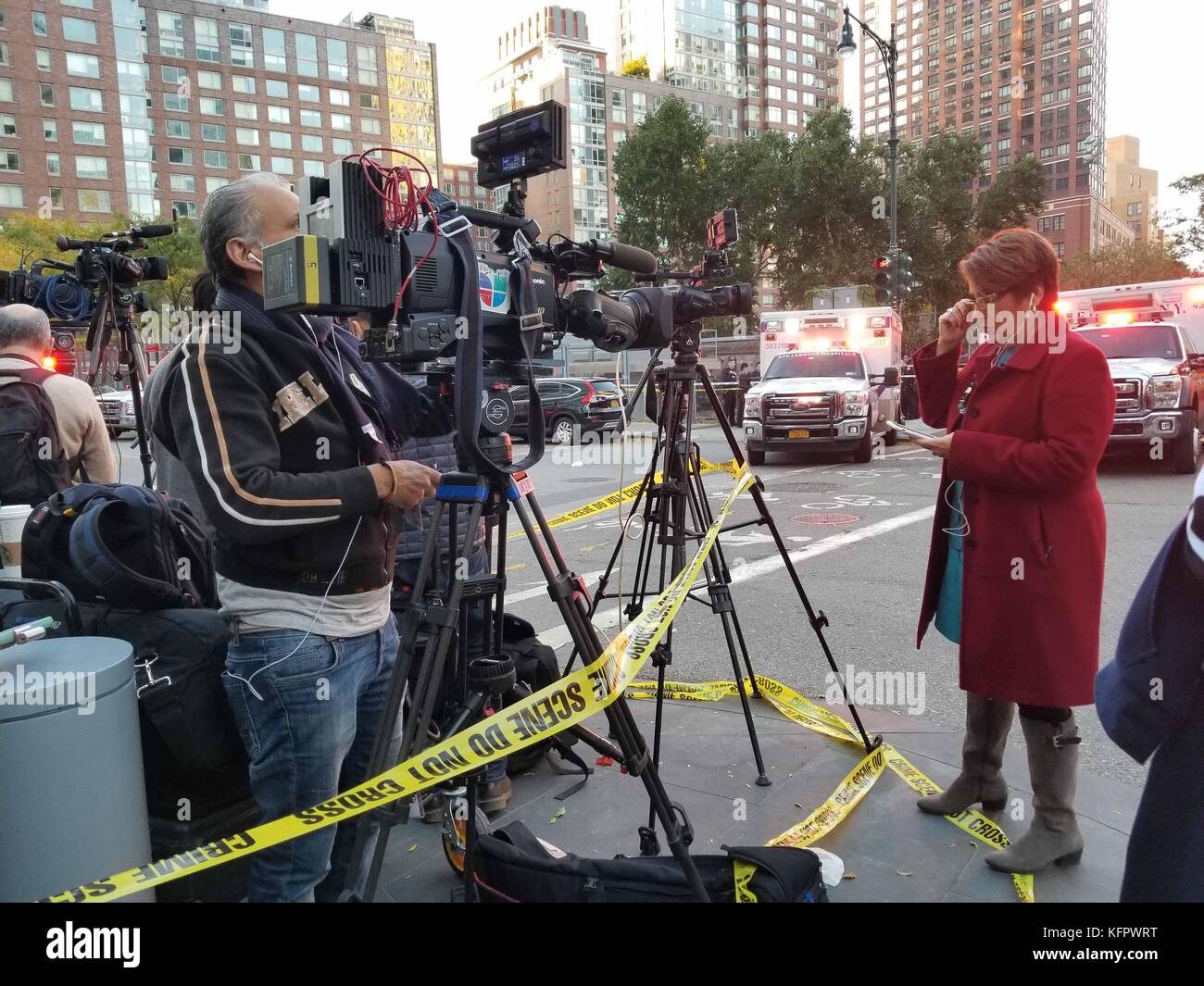 New York City, USA. 31st Oct, 2017. A news reporter gets ready to ...