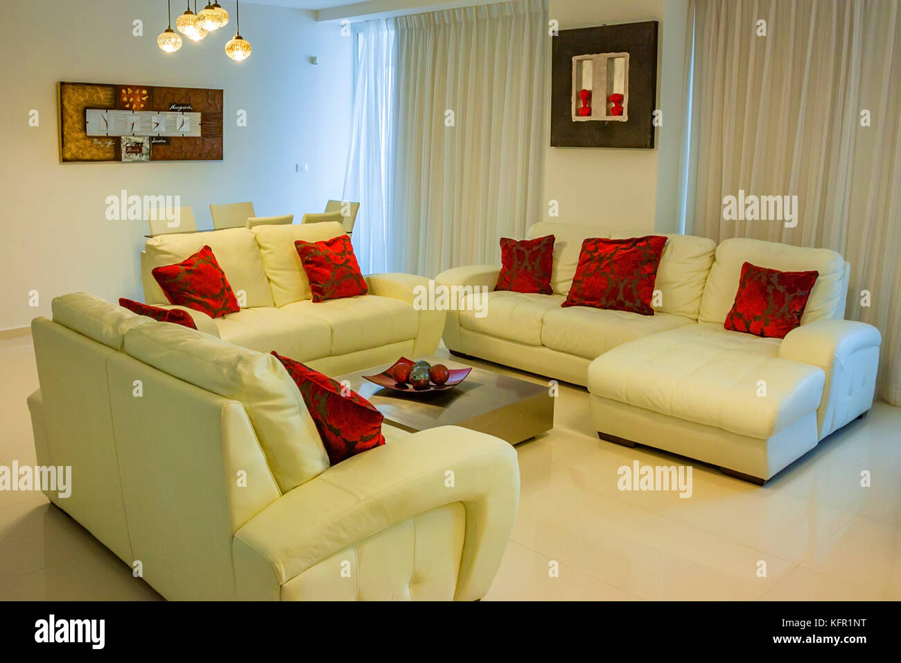 Interior of a modern hotel waiting area with white sofas, small table ...