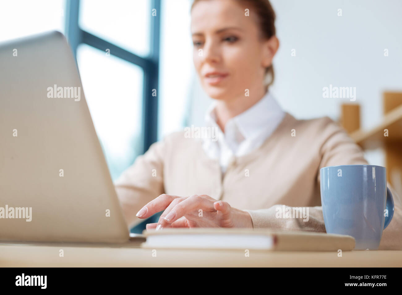 Close up of busy woman in the office Stock Photo - Alamy