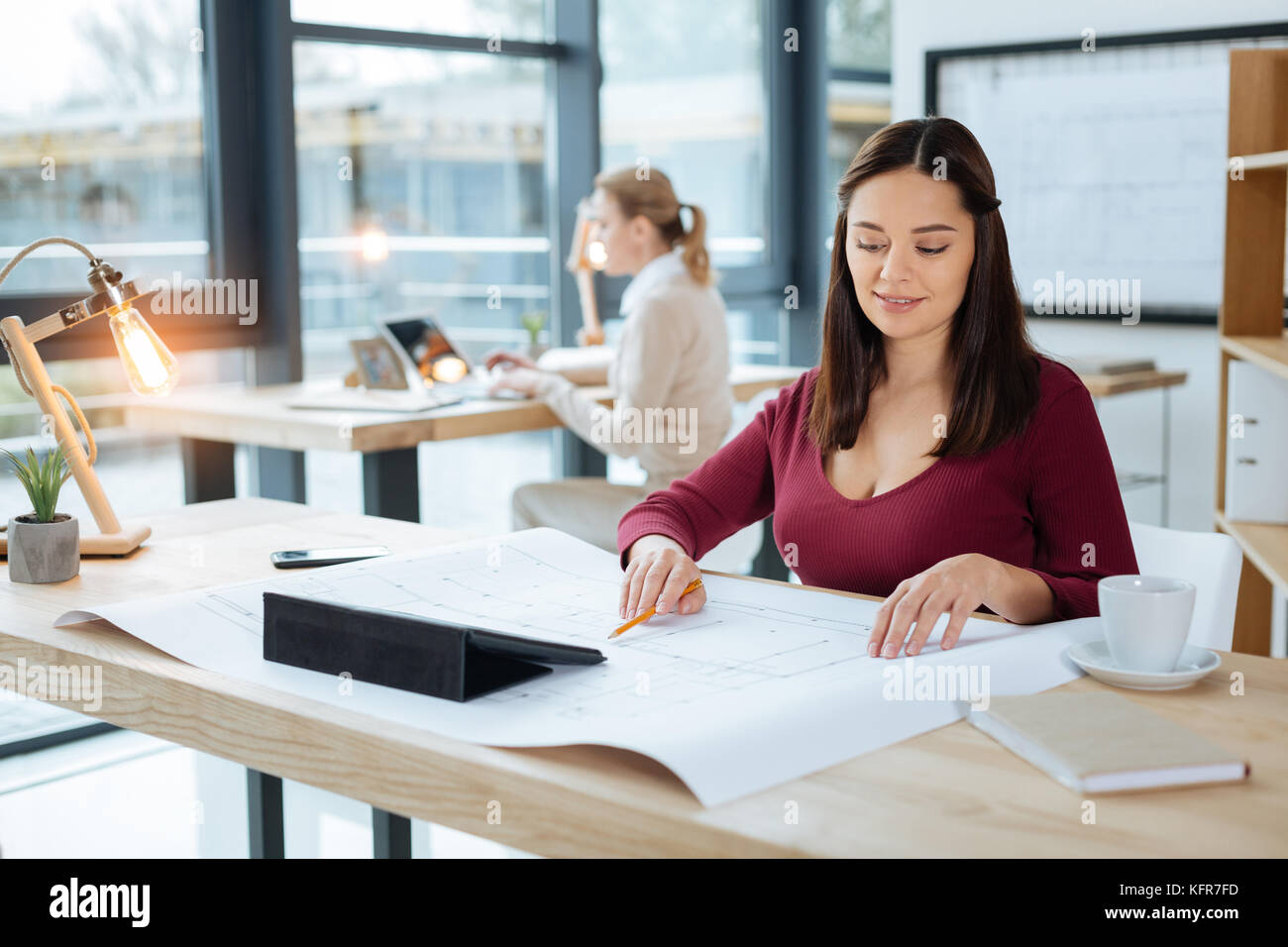 Talented designers working in the office Stock Photo - Alamy