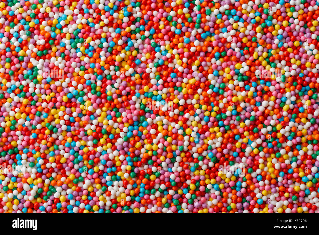 Backgrounds and textures: a lot of multicolored candy drops ...