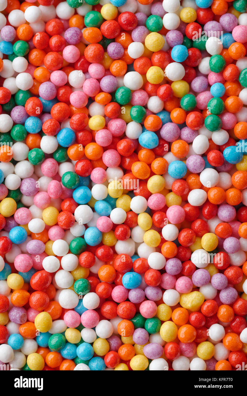 Backgrounds and textures: a lot of multicolored candy drops ...