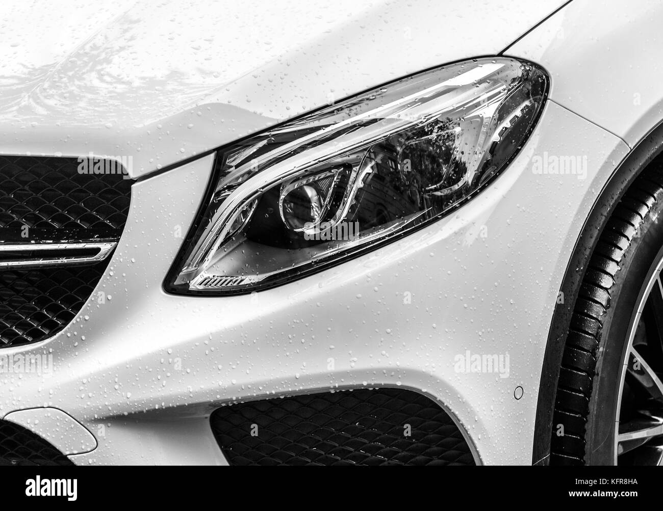 Element of a headlight of a white car Stock Photo - Alamy