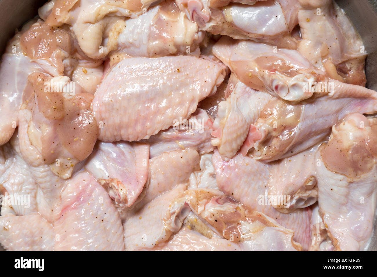 Raw chicken wing hi-res stock photography and images - Alamy