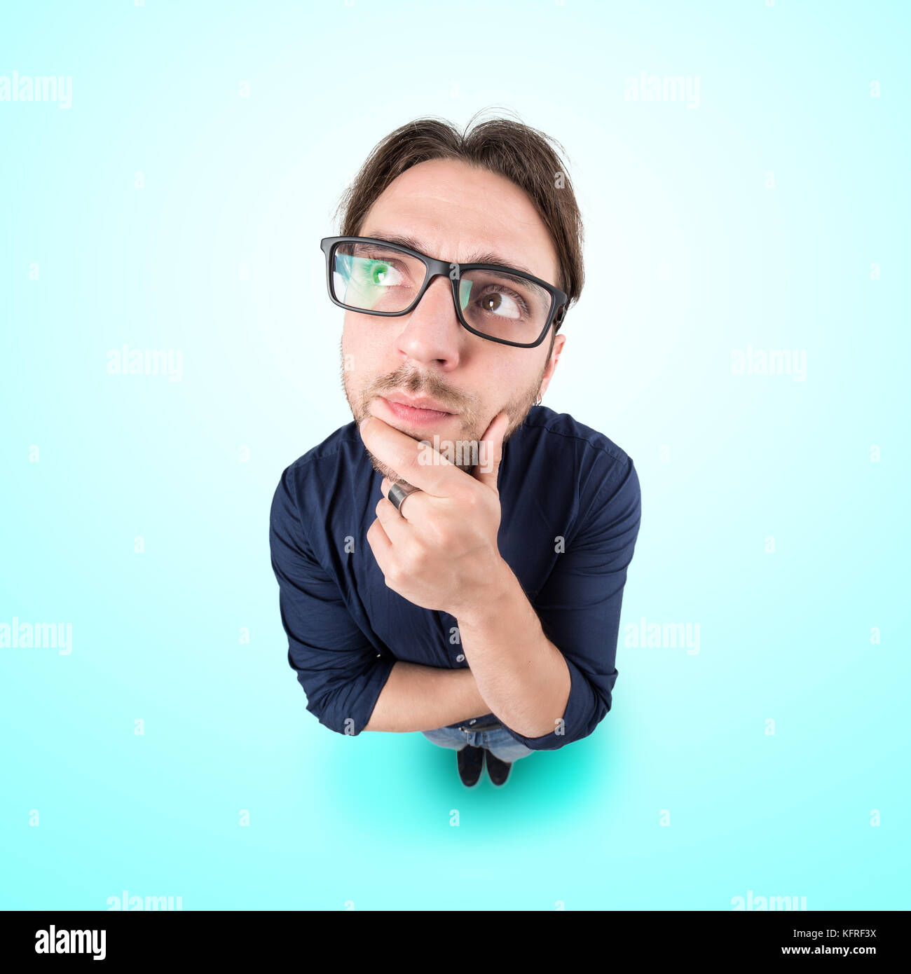 Funny man with thoughtful expression from above Stock Photo - Alamy