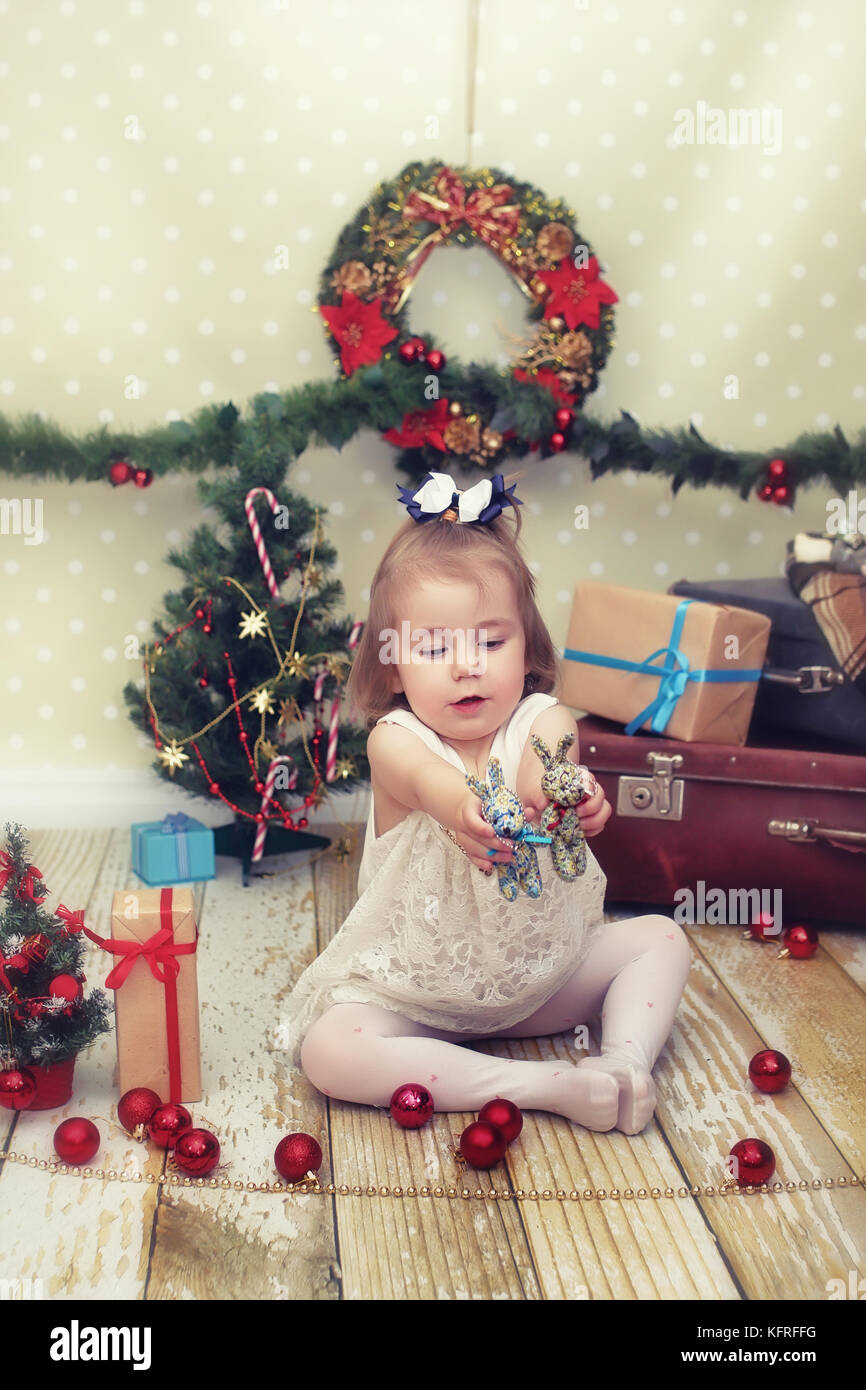 little girl and Christmas tree Stock Photo - Alamy