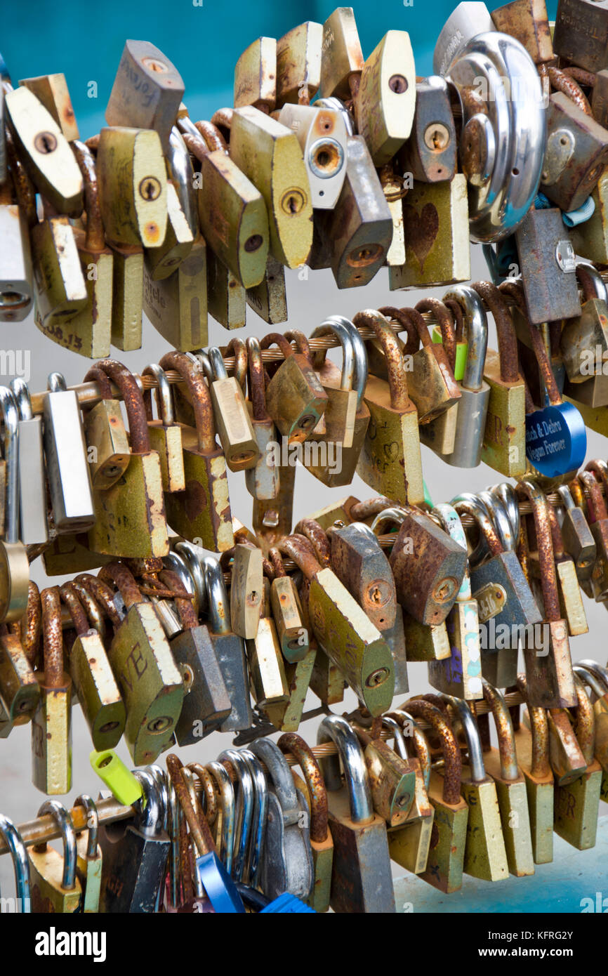 Love locks attached to Weir bridge, over the river Wye, Bakewell ...