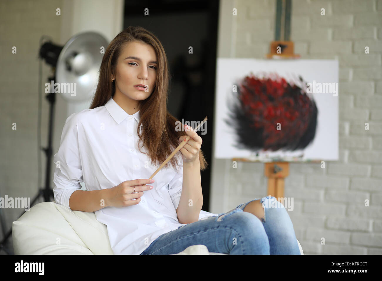 Beautiful girl artist at work Stock Photo - Alamy