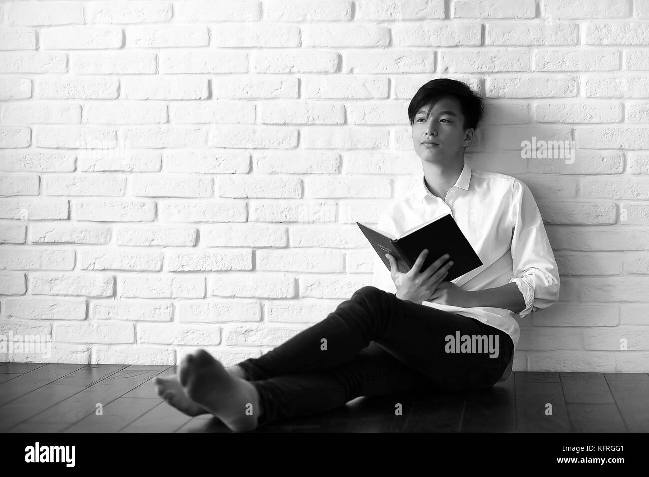 Asian student with books Stock Photo - Alamy