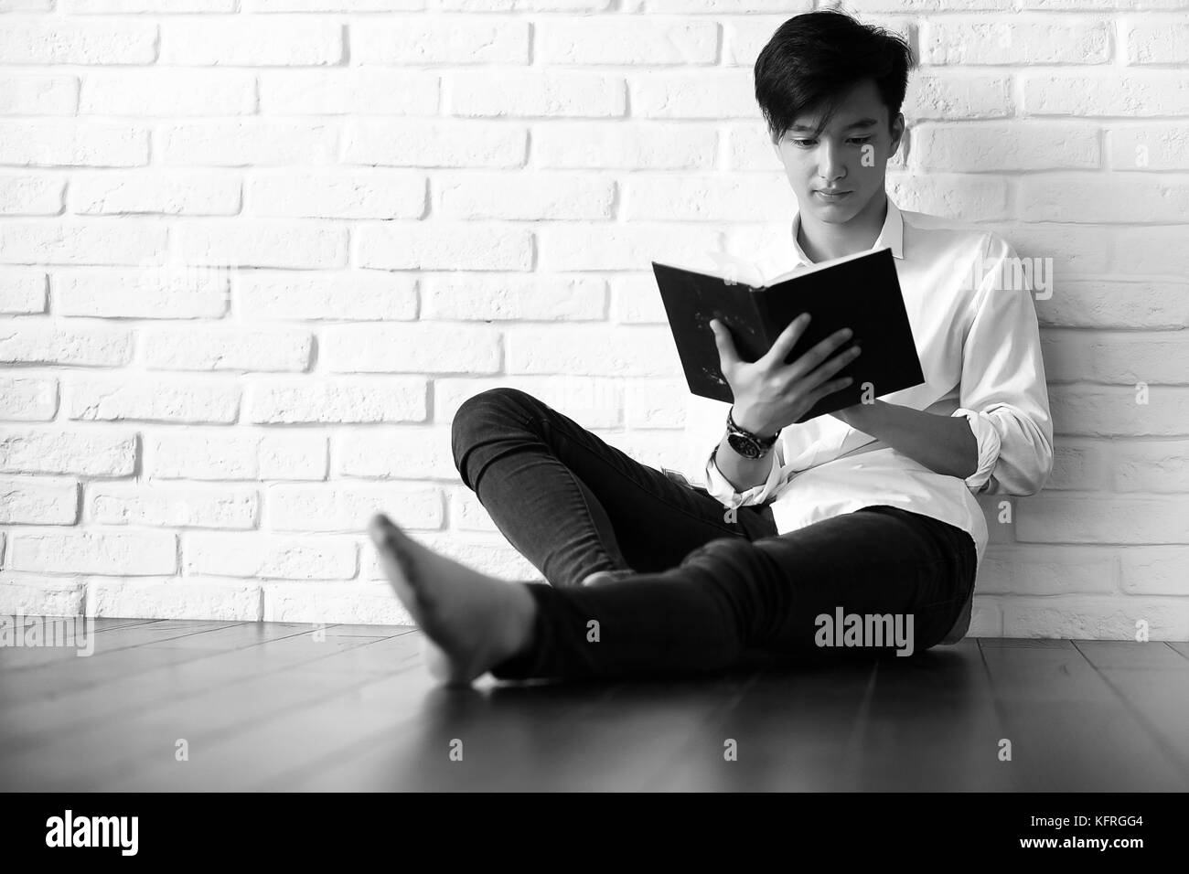 Asian student with books Stock Photo - Alamy