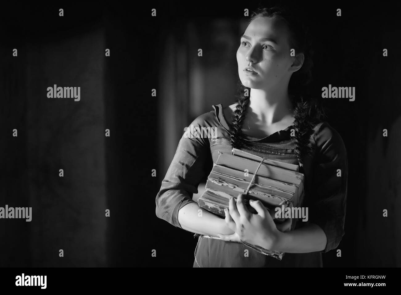 Retro girl in the old house reading books Stock Photo - Alamy