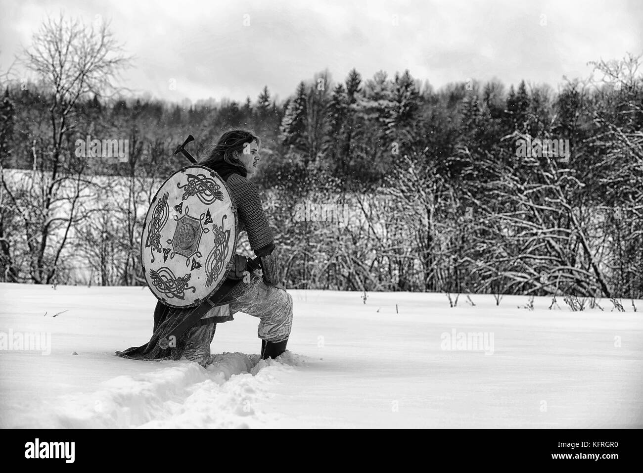 Defender the young warrior in armor Stock Photo - Alamy