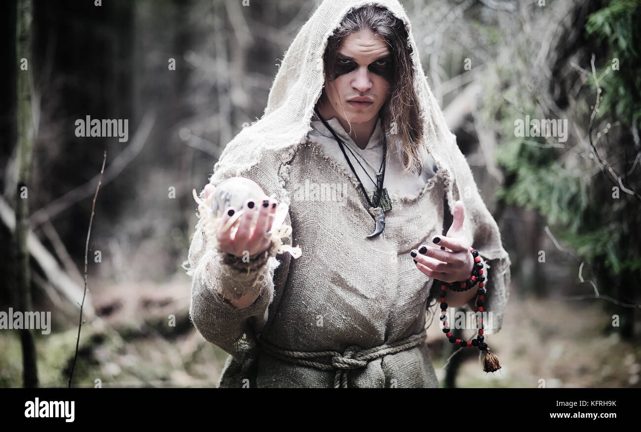 Fairy magician. A sorcerer with a glass sphere, a magical spell Stock ...