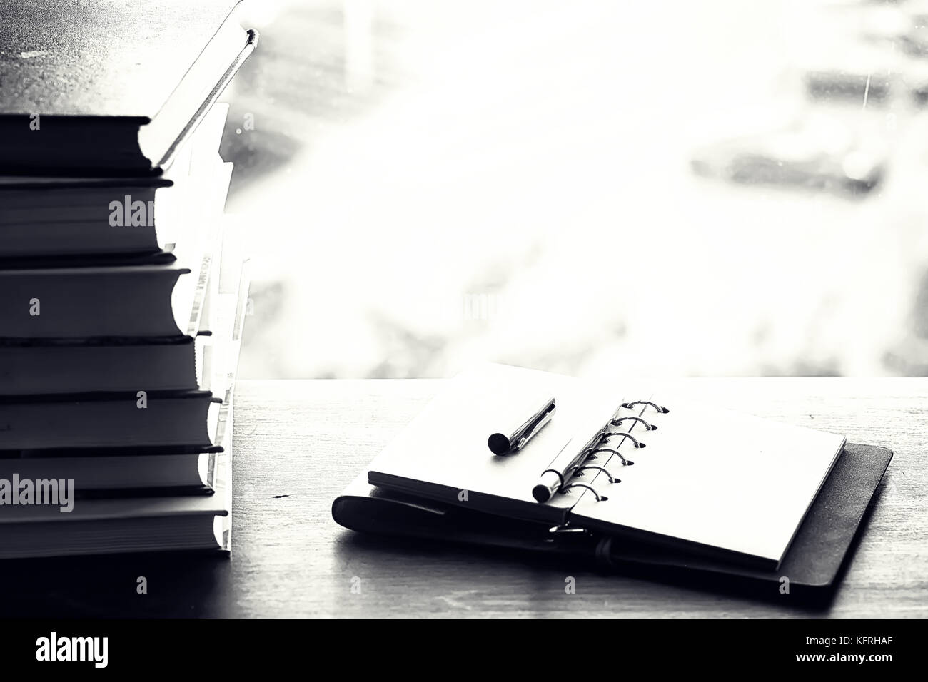A stack of textbooks on a table Stock Photo - Alamy