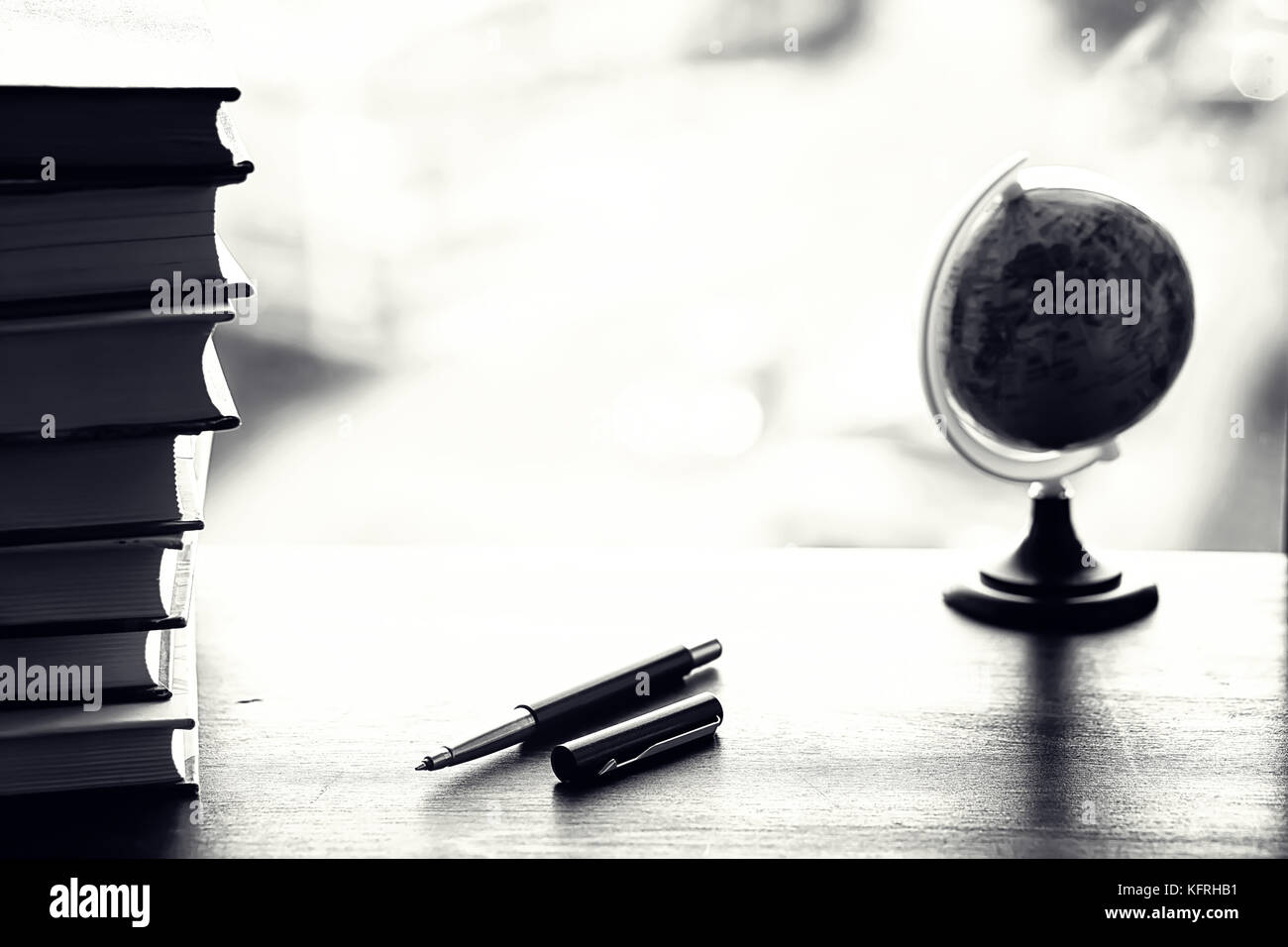 A stack of textbooks on a table Stock Photo - Alamy