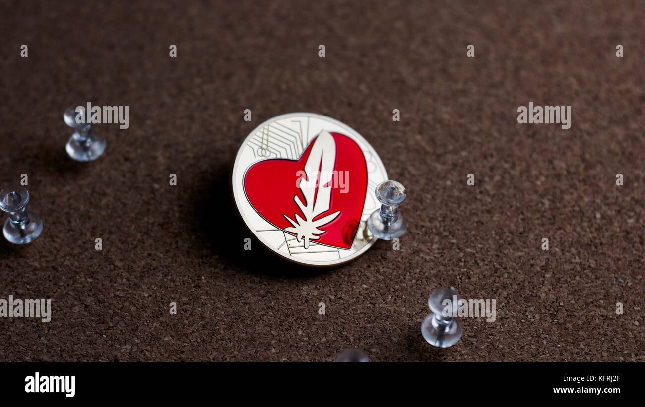 Digital currency physical gold feather coin. Office cryptocurrency ...