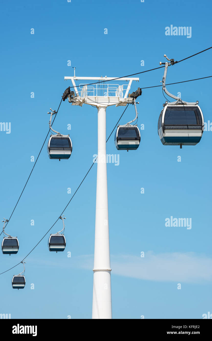 Passenger cable way cabins in the sky Stock Photo - Alamy