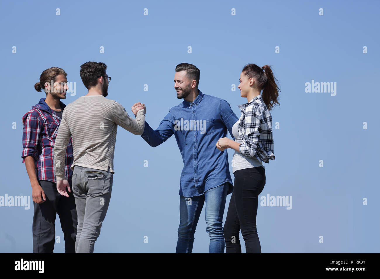 friends greet each other with a handshake .photo with copy space Stock ...