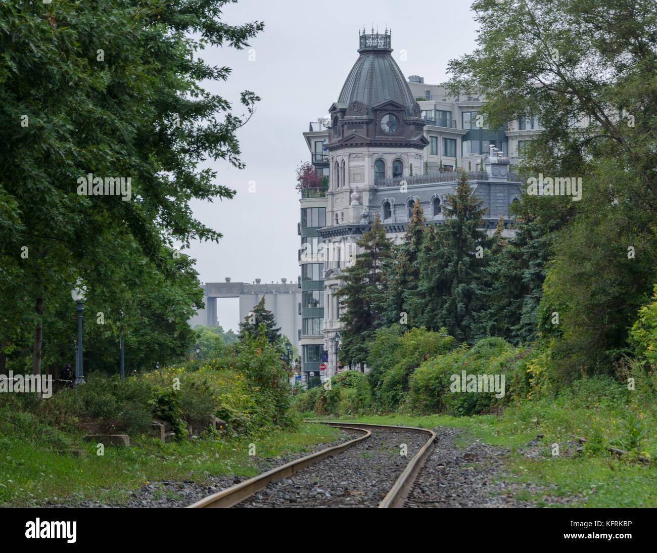 The exclusive Club 357c is seen beyond curving railroad tracks in Old ...