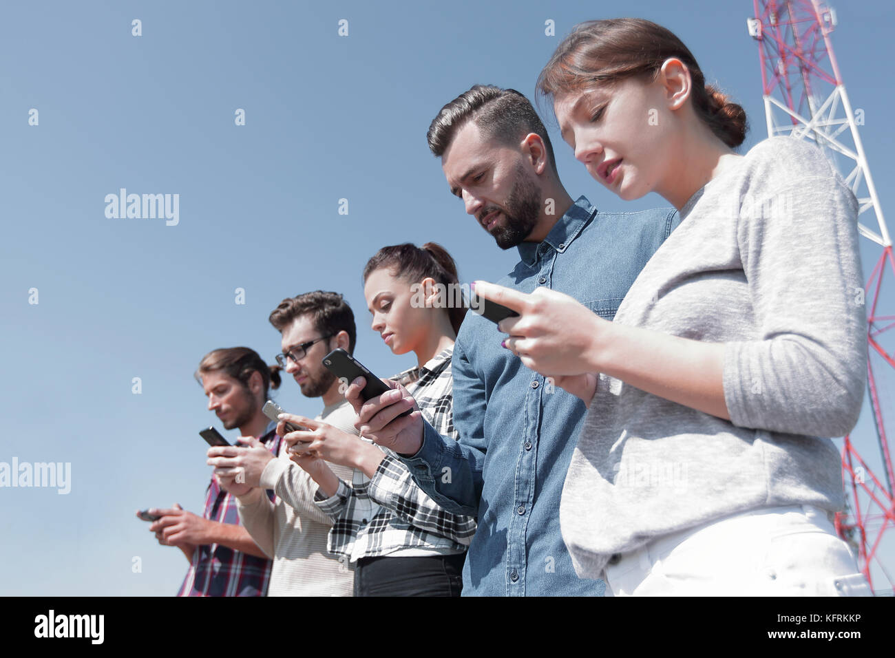 young people using smartphones to search network.photo with copy space ...