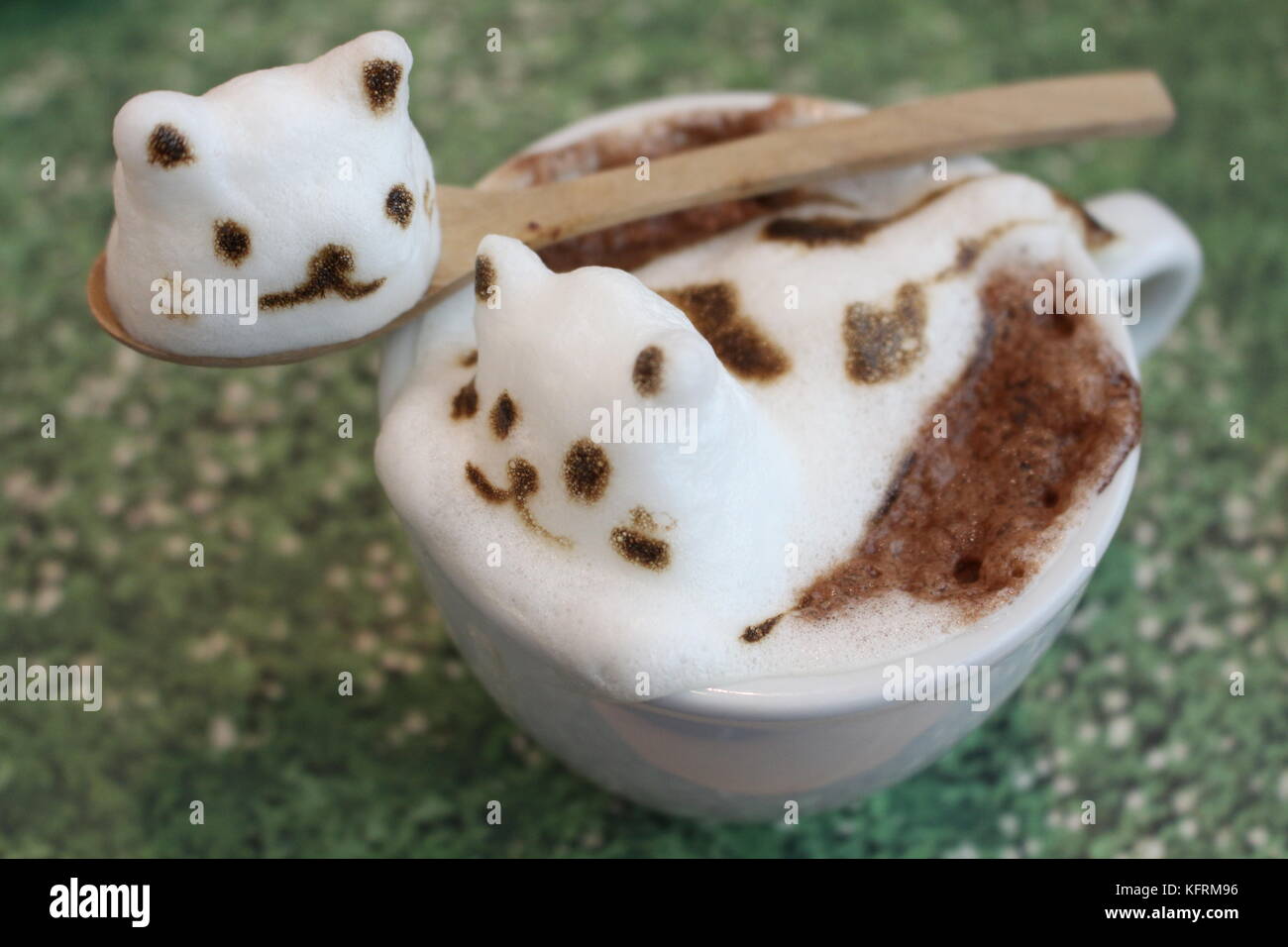 A cup of coffee Cute cats hot late chocolate with green background ...