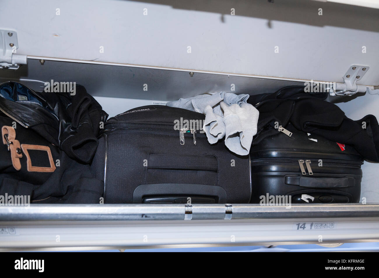 Carry on luggage bag passenger locker High Resolution Stock Photography ...