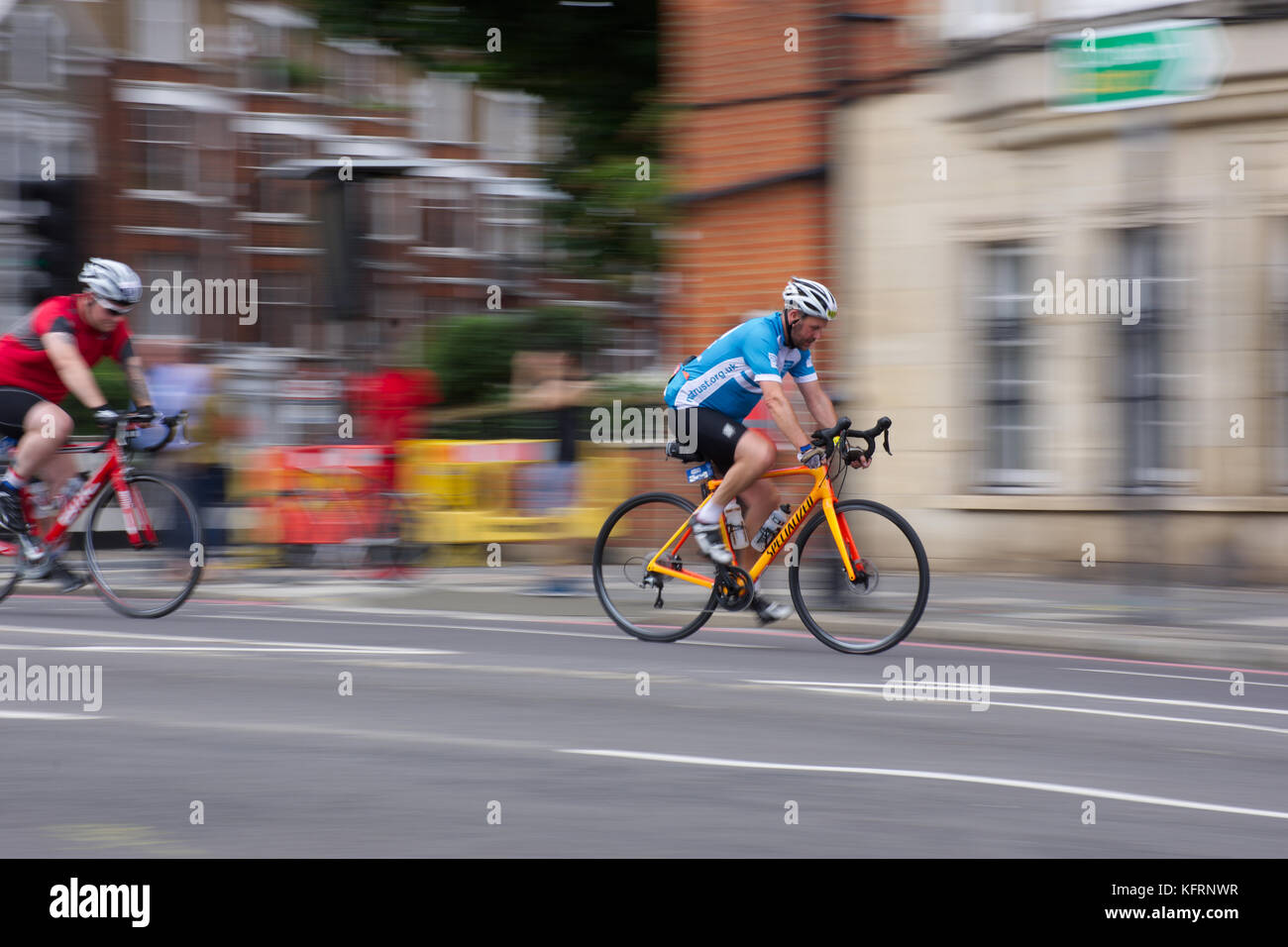 Two man with bikes hi-res stock photography and images - Alamy
