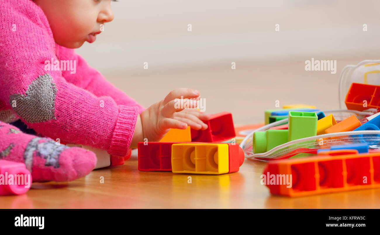Baby Girl Playing Colored Blocks High Resolution Stock Photography and ...