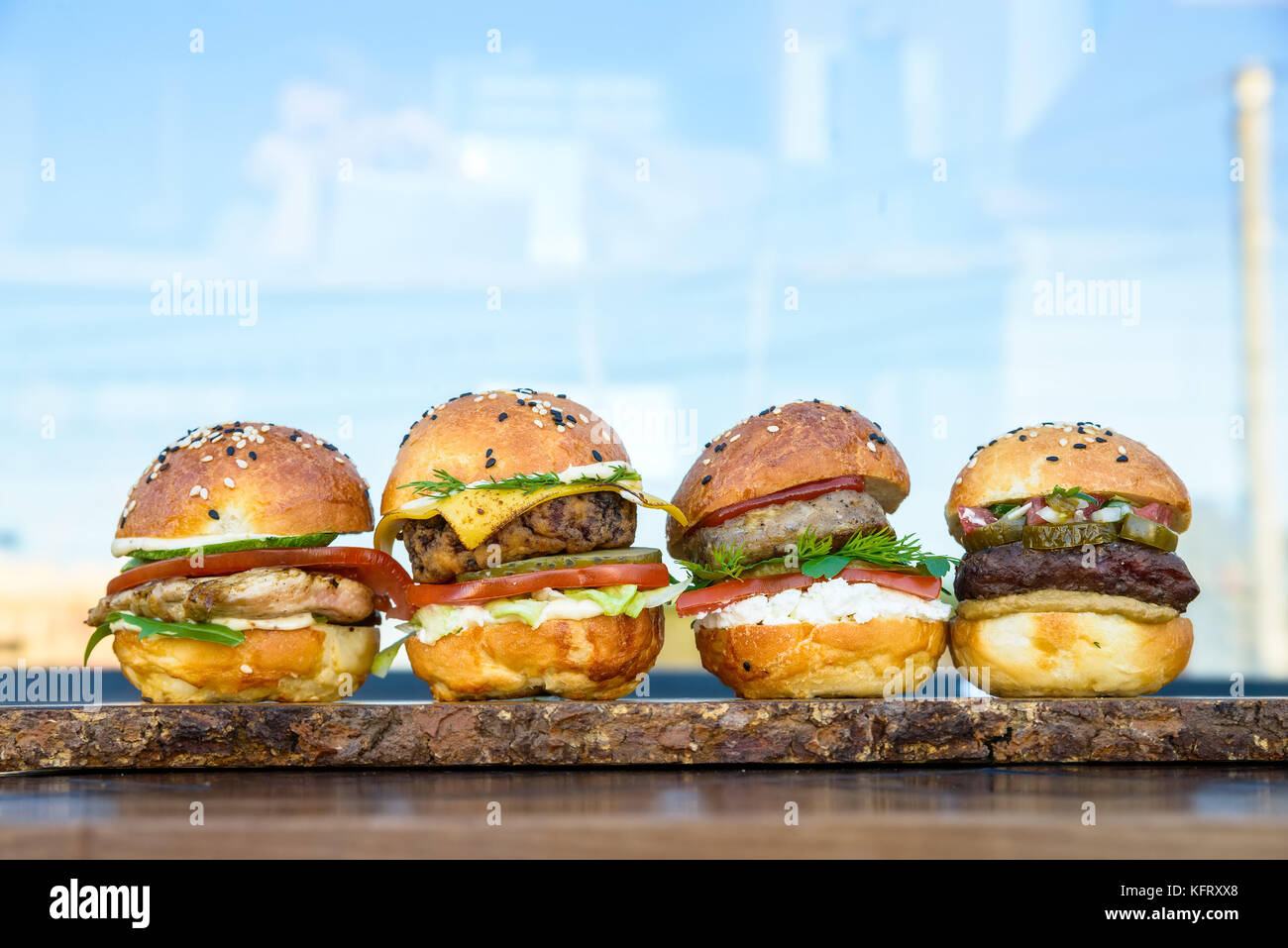 Four burgers hi-res stock photography and images - Alamy