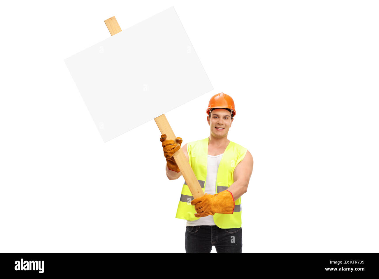 Construction worker holding a blank cardboard sign isolated on white ...