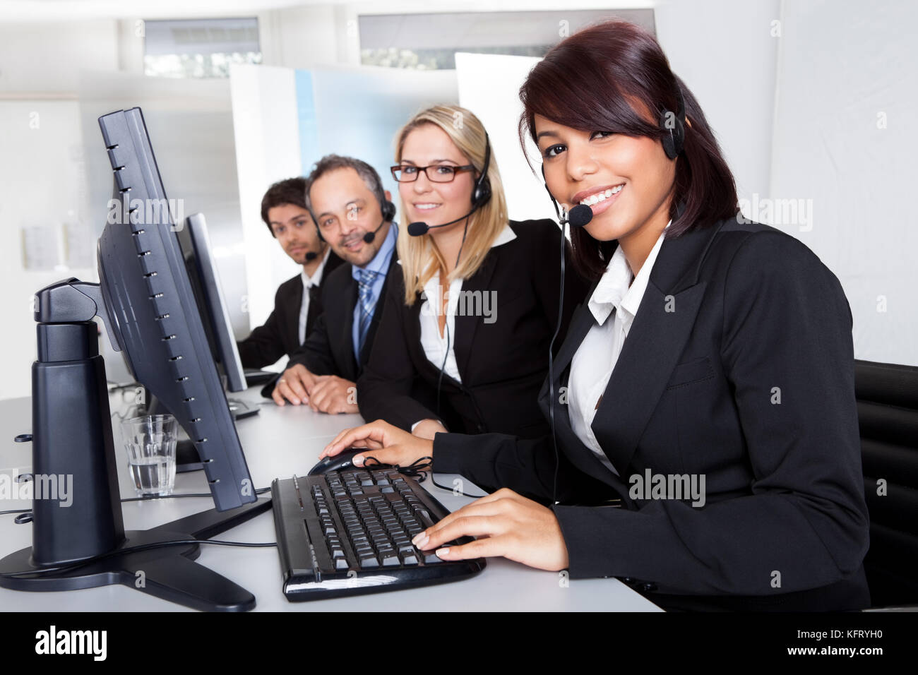 Group of young business customer service people Stock Photo - Alamy