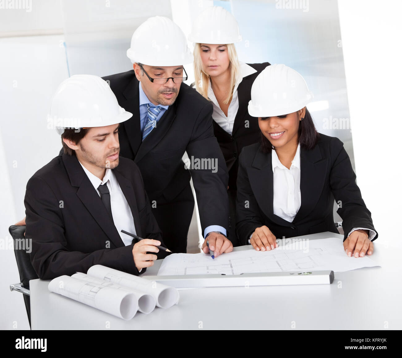 Group of architects at the meeting discussing the project Stock Photo ...