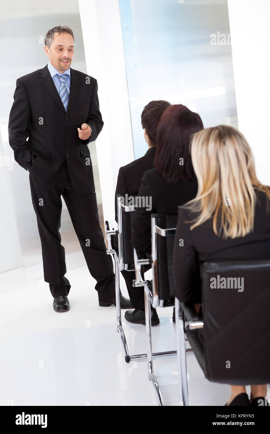 Group of successful business people at the lecture Stock Photo - Alamy