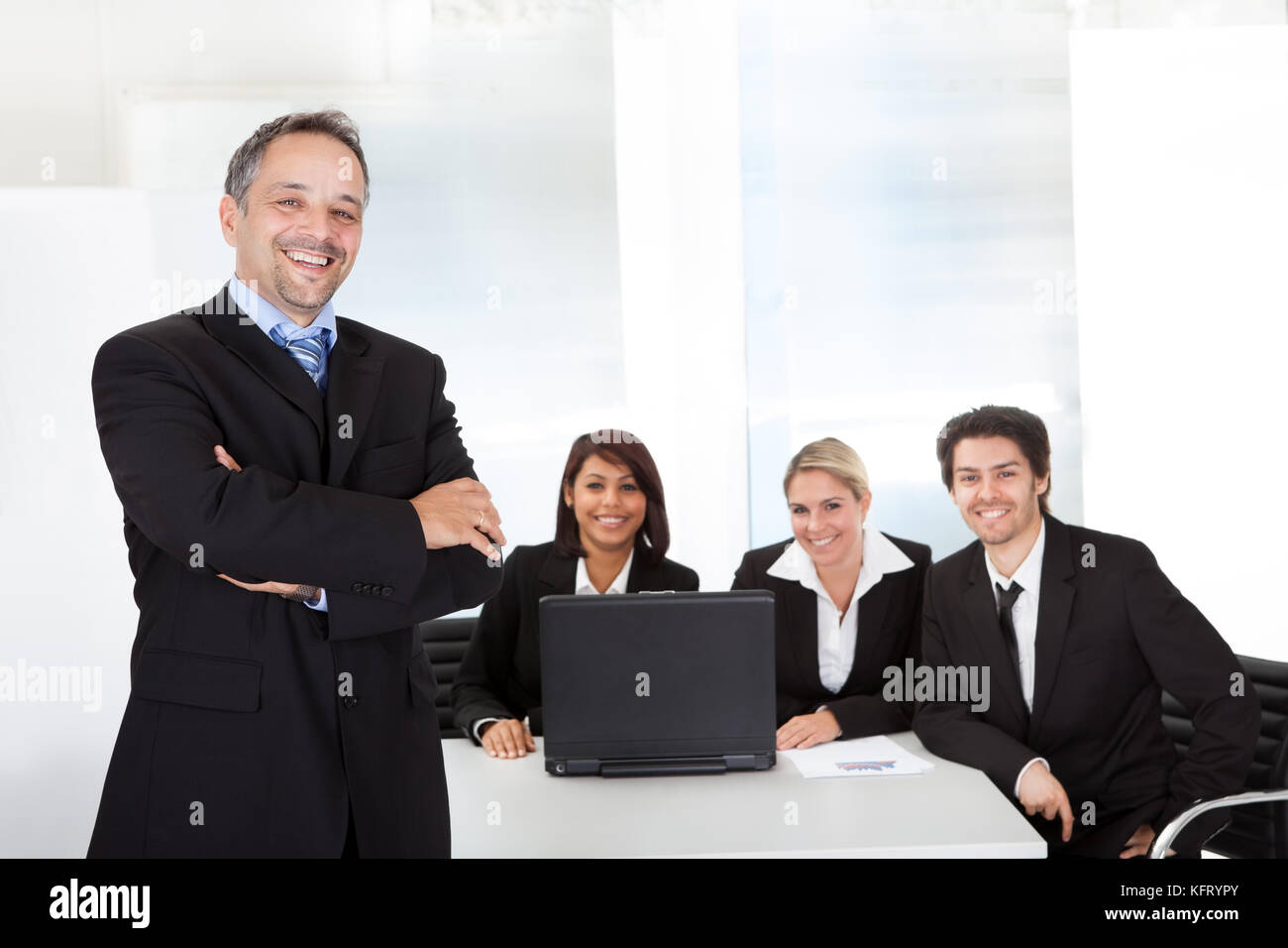 Portrait successful business man and his team Stock Photo - Alamy