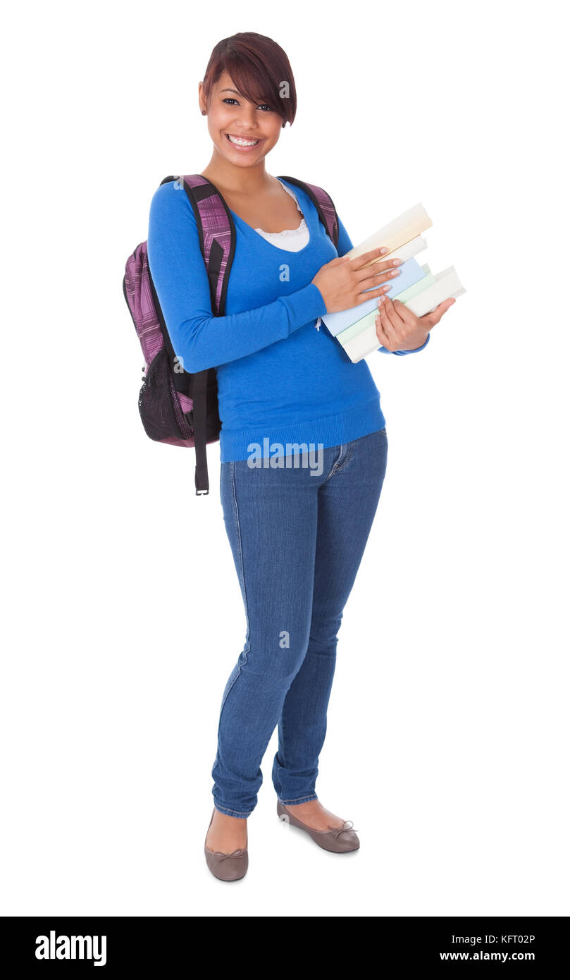 Portrait of beautiful student girl with books. Isolated on white Stock ...