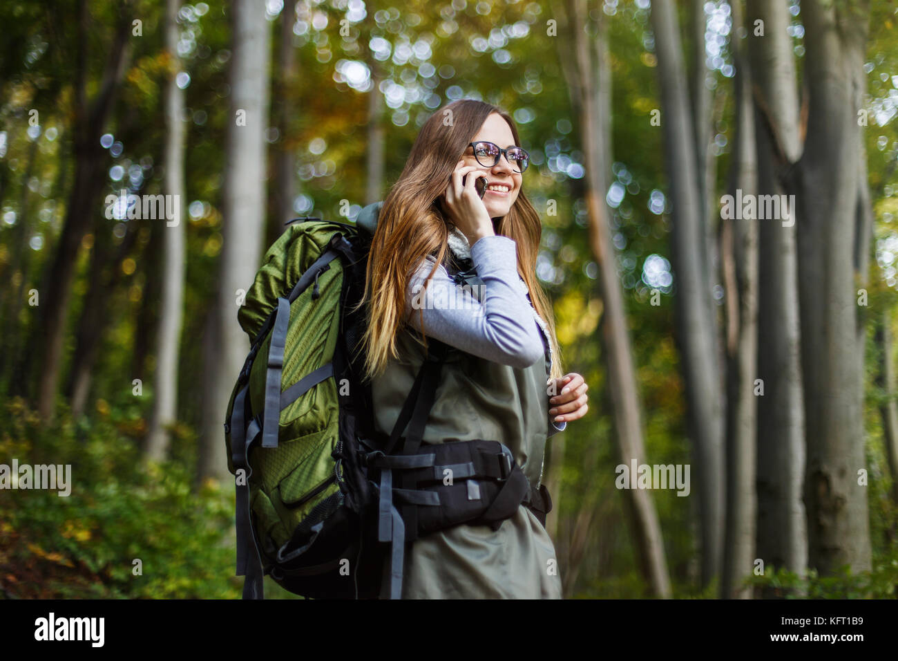 Girl in forest cell hi-res stock photography and images - Alamy