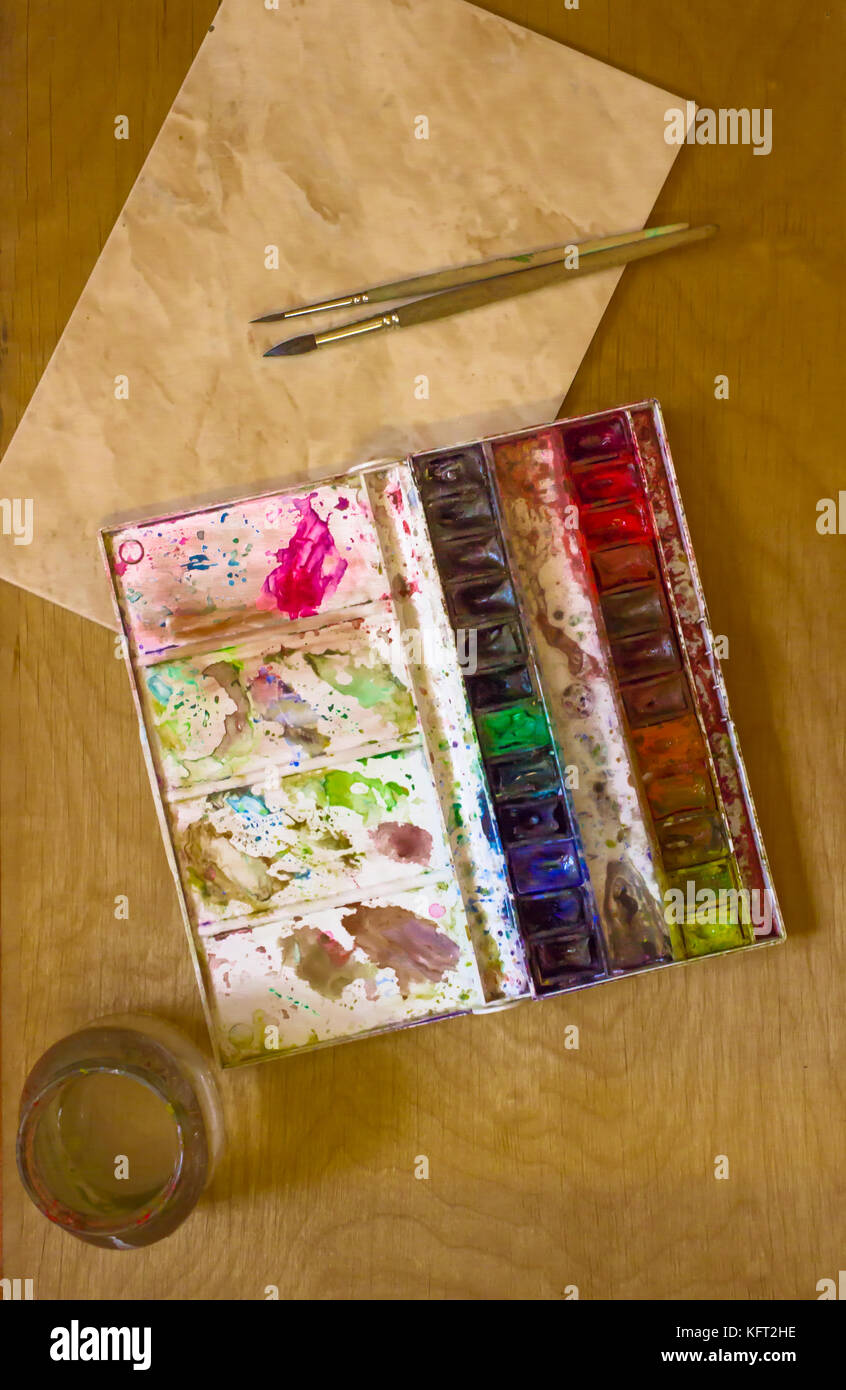 Professional dirty watercolor aquarell paints in box with brushes ...