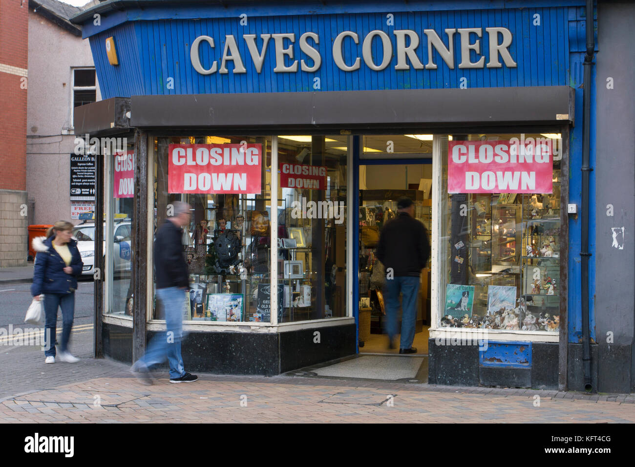 Out of focus figures passing Retail units To Let, UK independent shop ...