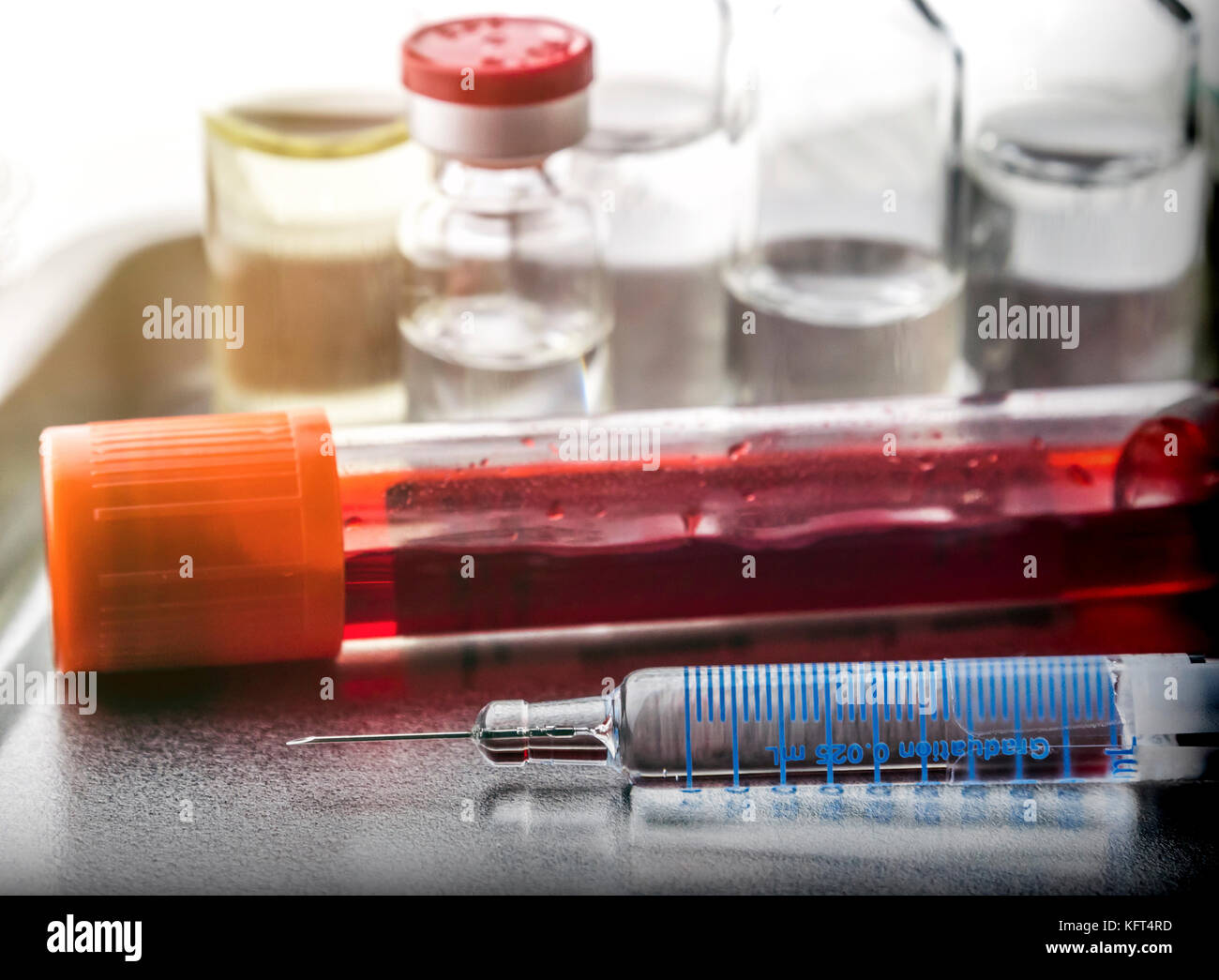Several Vials And Syringe In Laboratory, Conceptual Image Stock Photo - Alamy