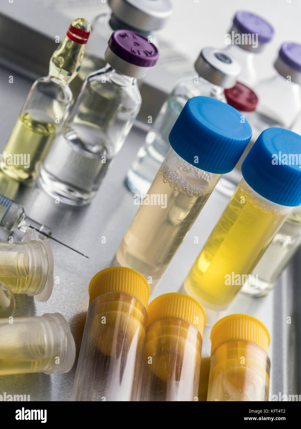 Several Vials And Syringe In Laboratory, Conceptual Image Stock Photo - Alamy