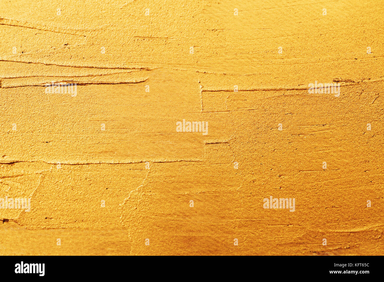 Golden shining stroke texture made with brush and paint hand drawn ...