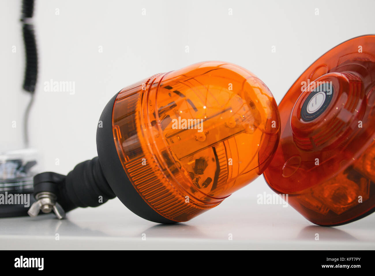 Orange flasher on table at exhibition Stock Photo - Alamy