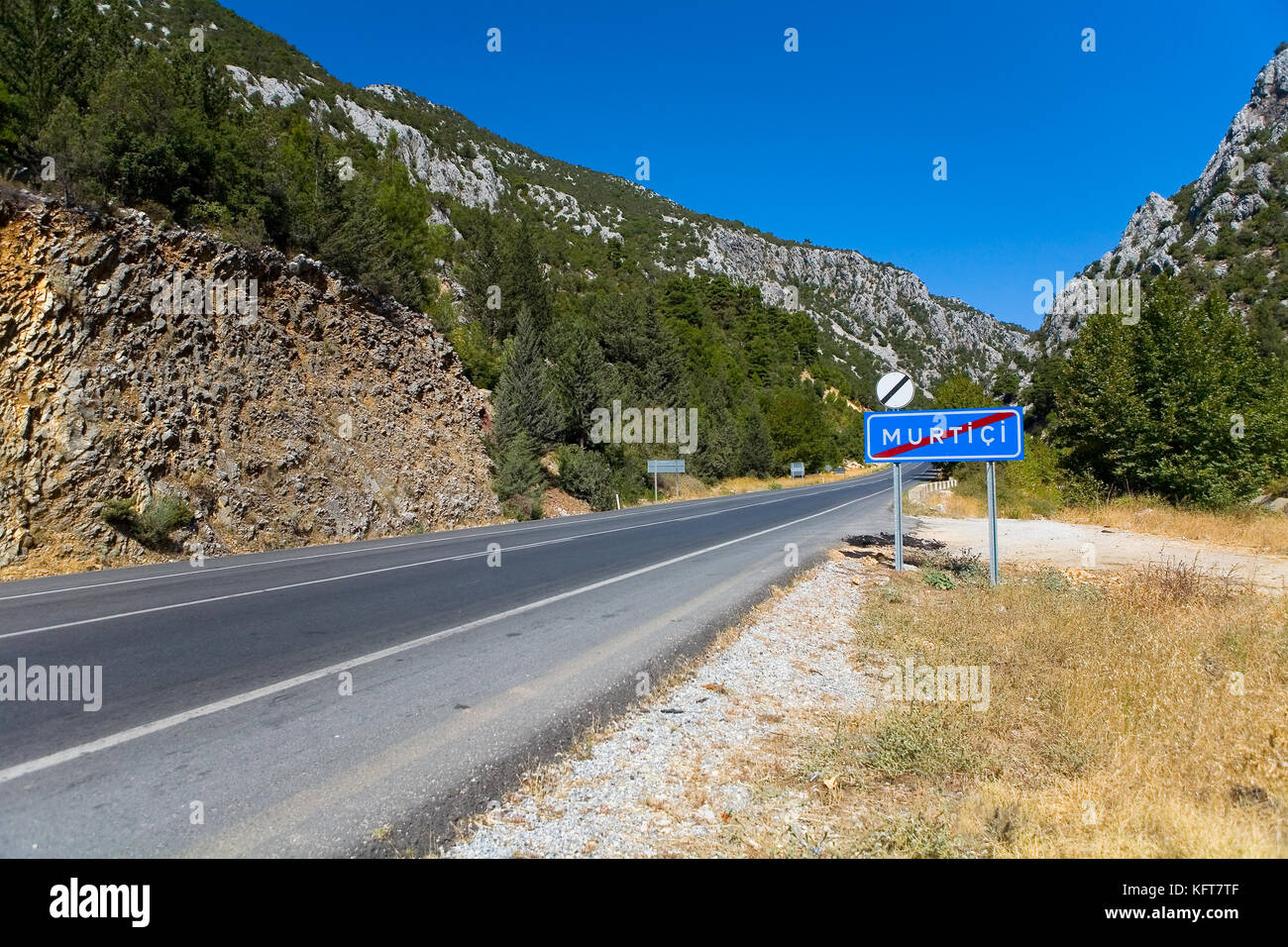 Road signs in Turkey. The sign "Murtici" is crossed out with a red ...