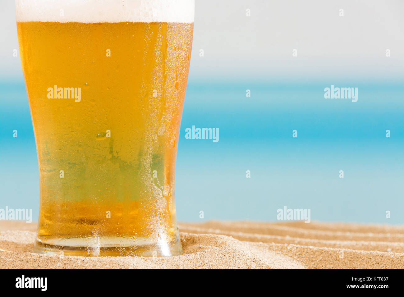 Beer on the beach Stock Photo - Alamy