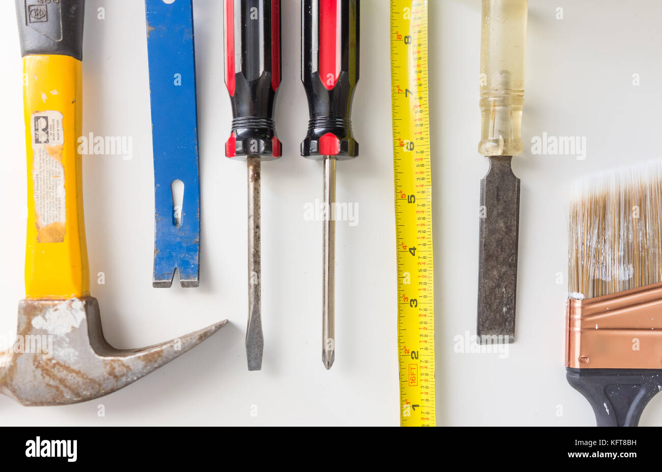 Various tools layed out on clean white background Stock Photo - Alamy