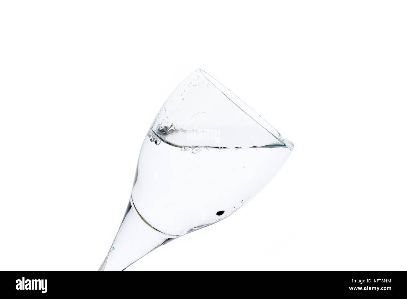 A water glass on white background, isolated in backlight Stock Photo ...